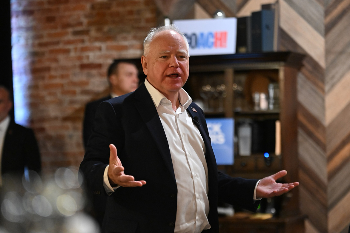Governor Tim Walz engages with Black community members at Vino & Vines ...